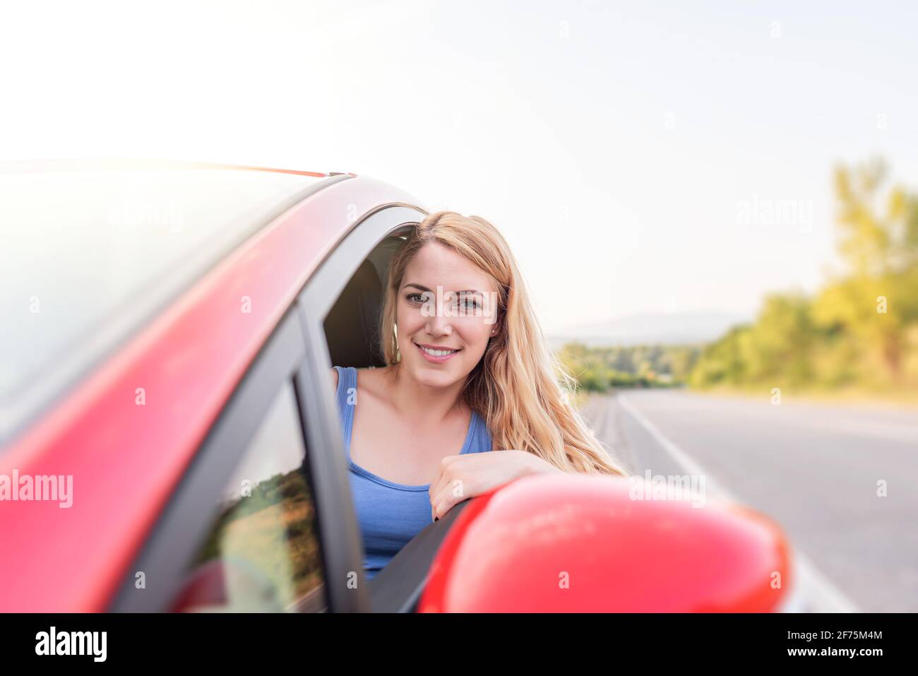 Teenage woman driving car hi-res stock photography and images - Alamy