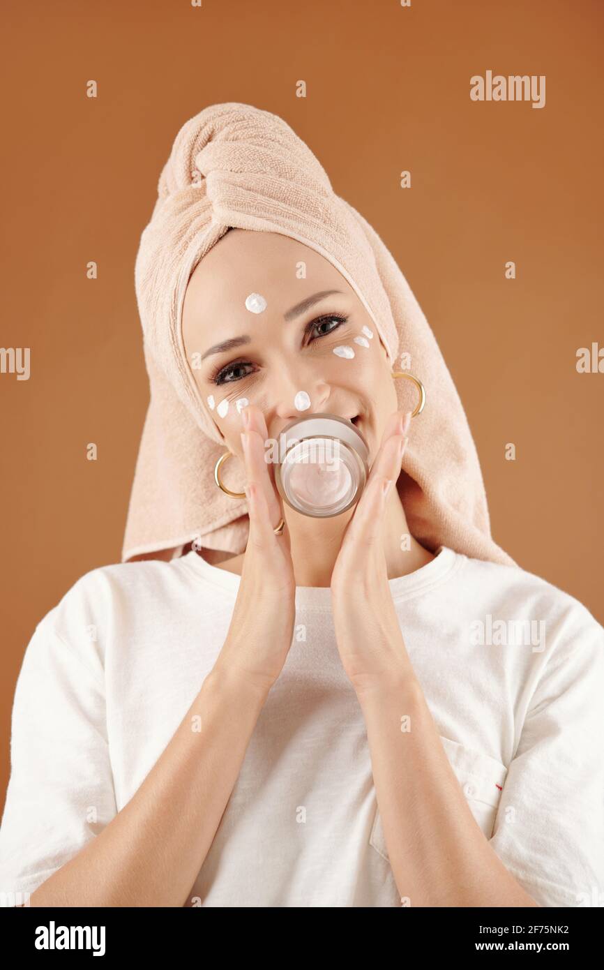 Applying lotion after shower hi-res stock photography and images - Alamy