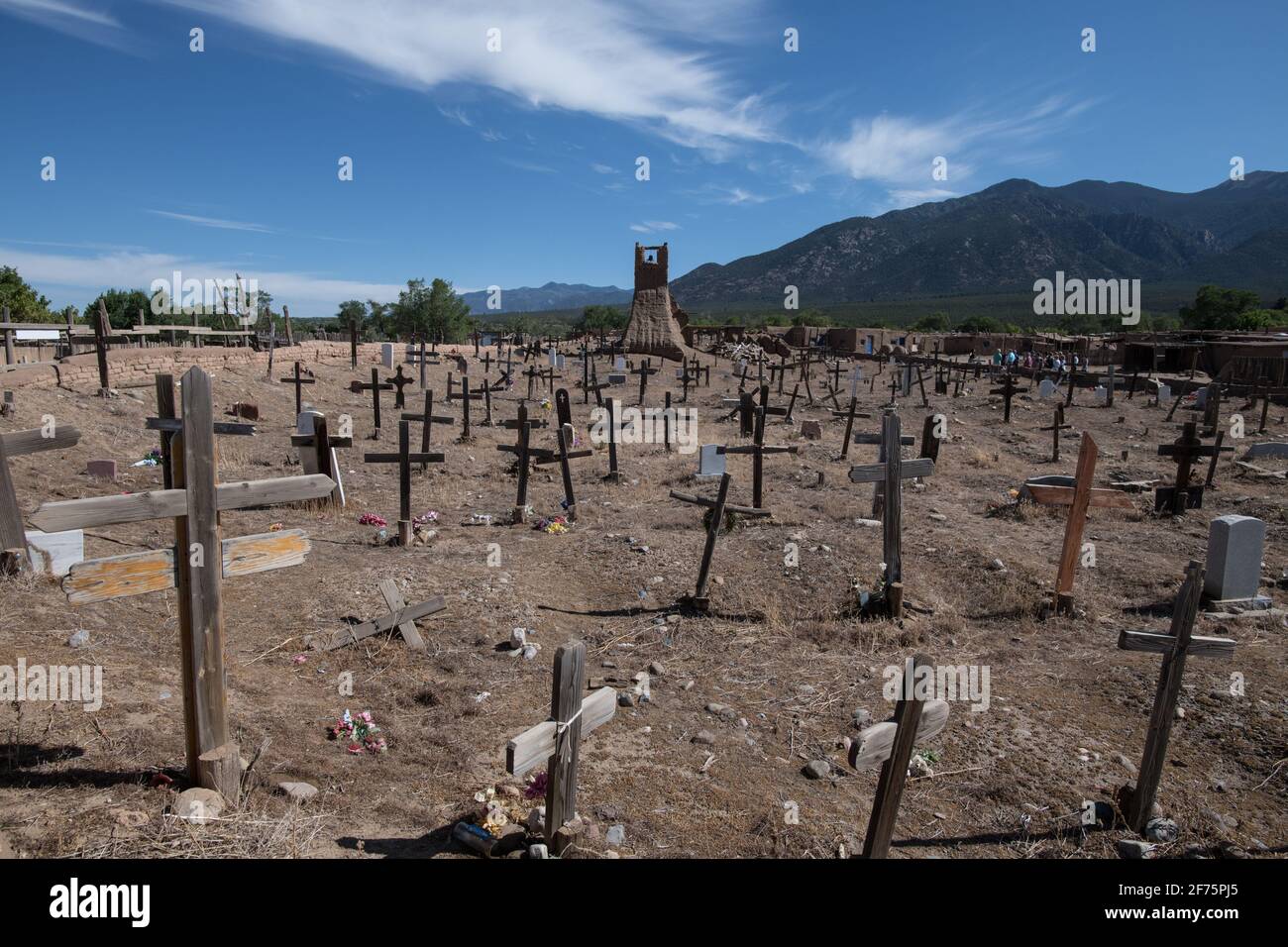 The historic Taos Pueblo cemetery in New Mexico, featuring weathered ...