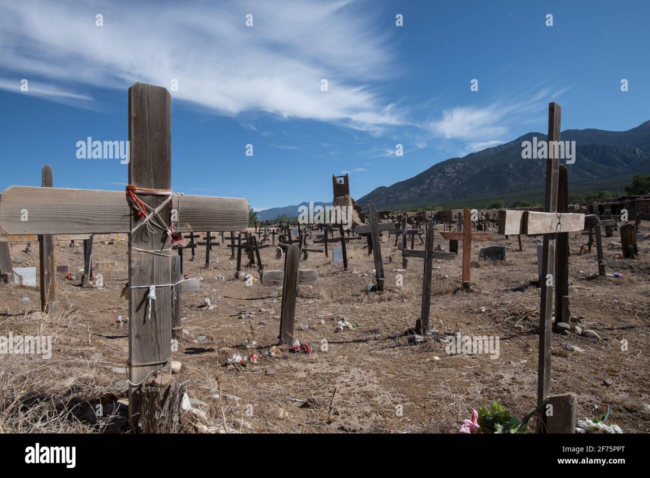 The historic Taos Pueblo cemetery in New Mexico, featuring weathered ...