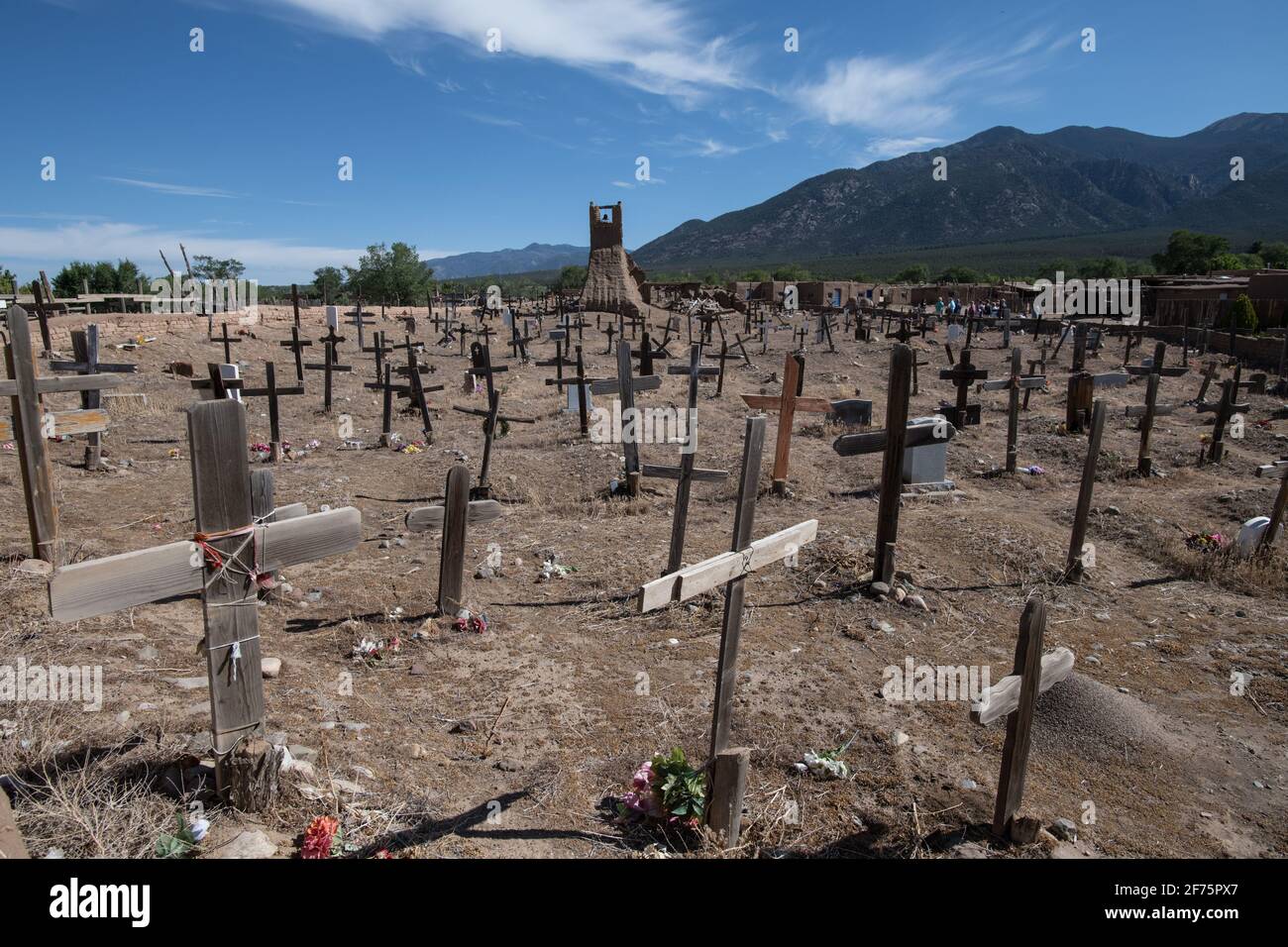 The historic Taos Pueblo cemetery in New Mexico, featuring weathered ...