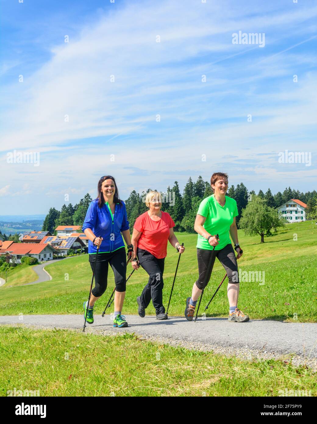 Women walking together in sunshine hi-res stock photography and images ...