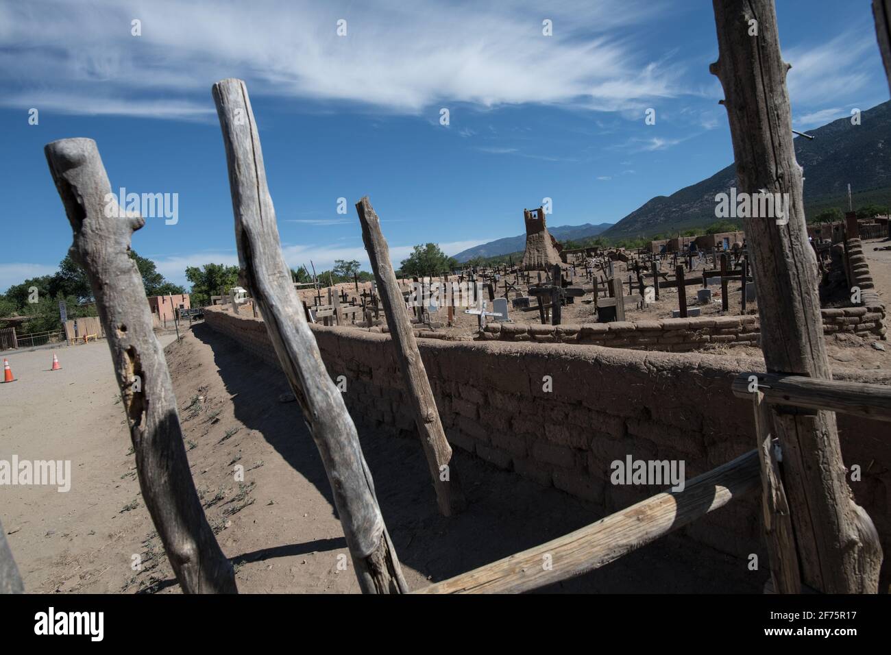 The historic Taos Pueblo cemetery in New Mexico, featuring weathered ...