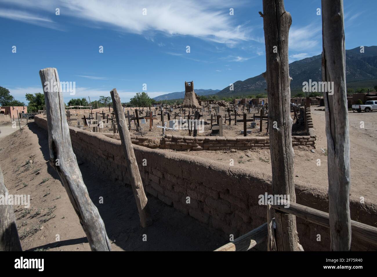 The historic Taos Pueblo cemetery in New Mexico, featuring weathered ...