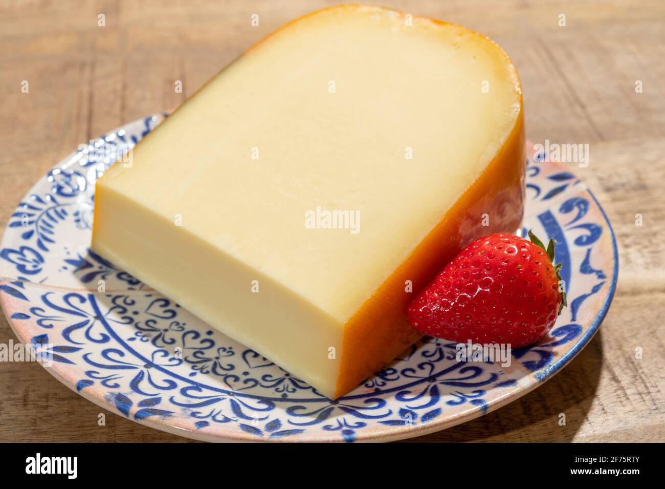 Cheese collection, piece of young Dutch gouda cheese made from cow milk ...