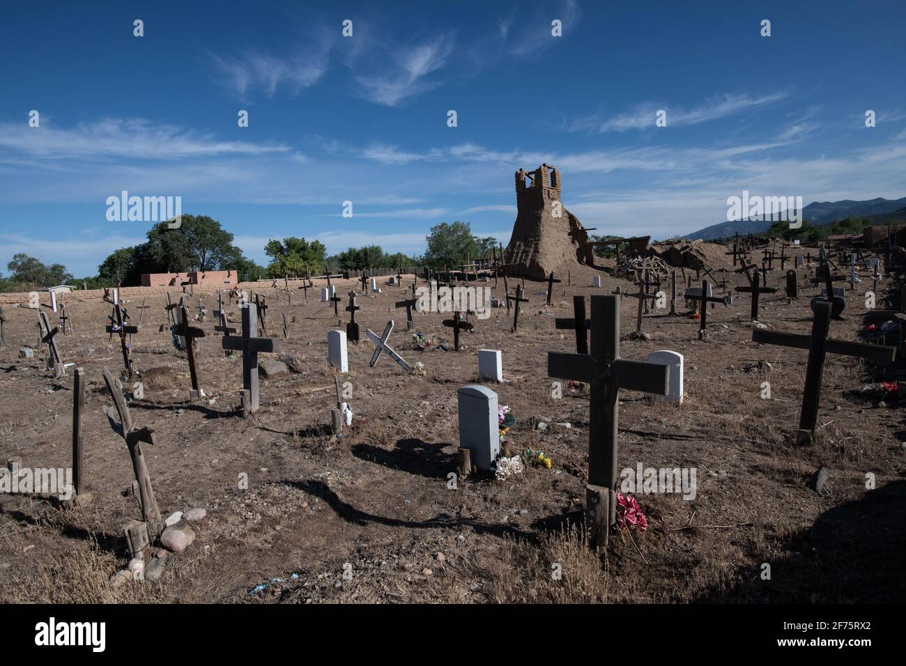The historic Taos Pueblo cemetery in New Mexico, featuring weathered ...