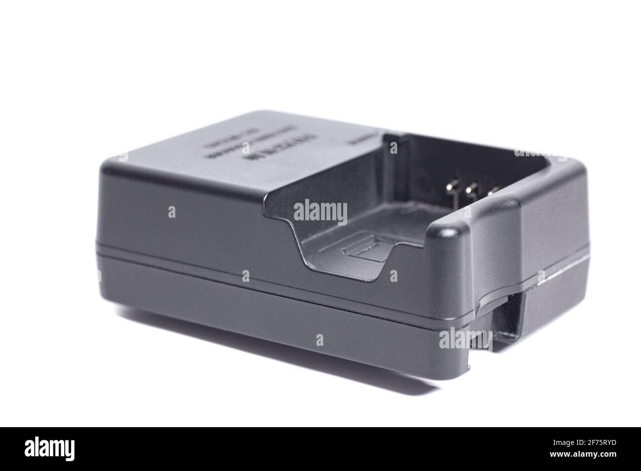 Charger for digital cameras isolated on white background Stock Photo ...