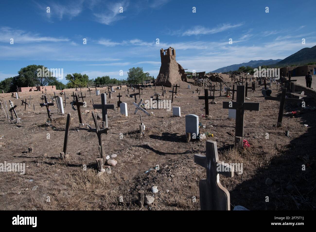 The historic Taos Pueblo cemetery in New Mexico, featuring weathered ...