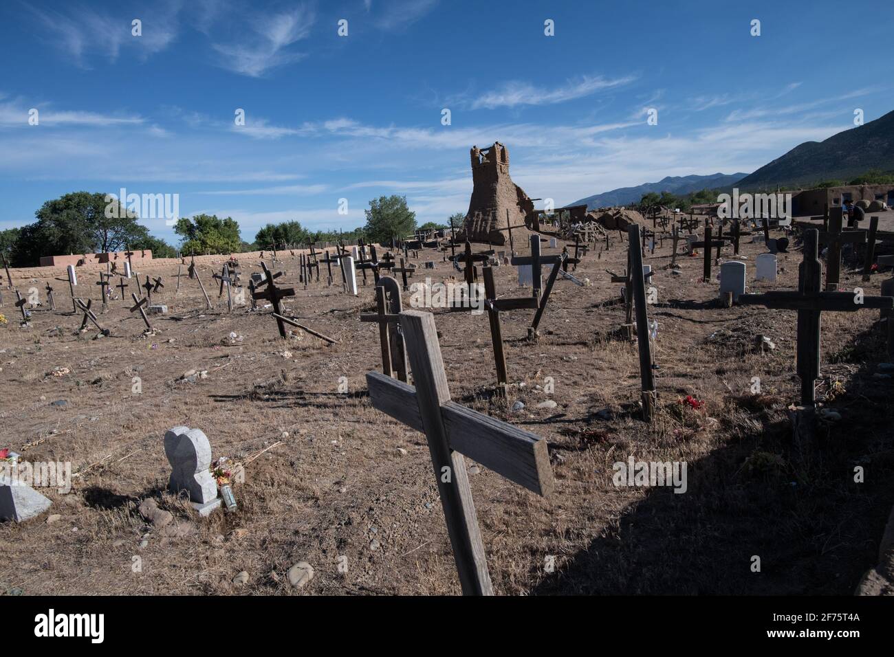 The historic Taos Pueblo cemetery in New Mexico, featuring weathered ...