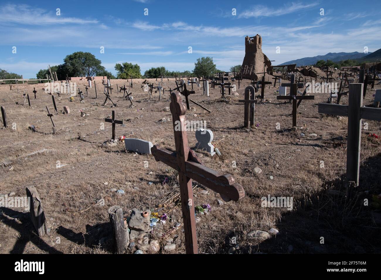 The historic Taos Pueblo cemetery in New Mexico, featuring weathered ...