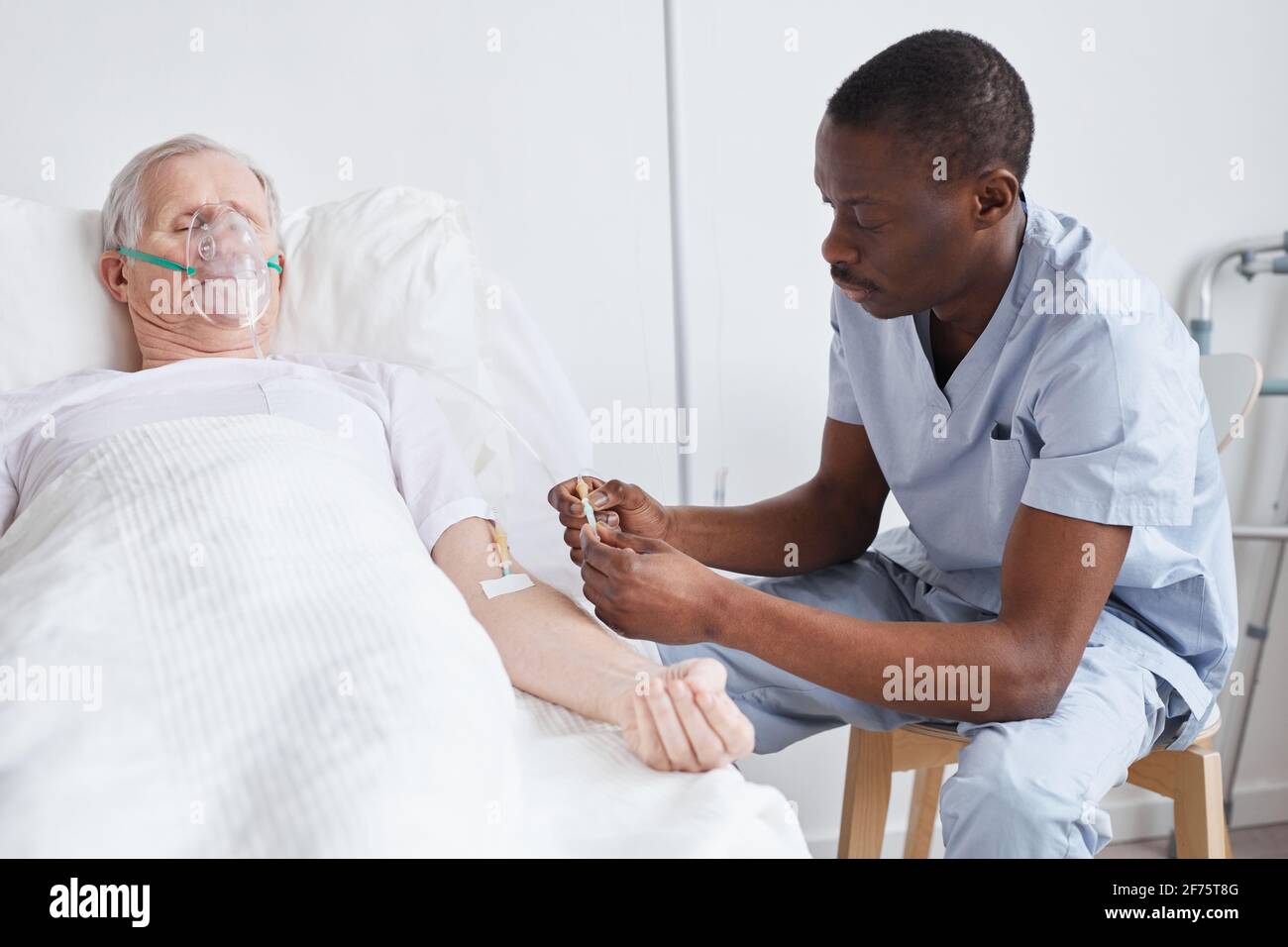 Patient In Hospital Bed Iv