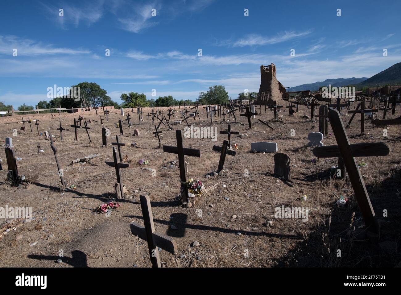 The historic Taos Pueblo cemetery in New Mexico, featuring weathered ...