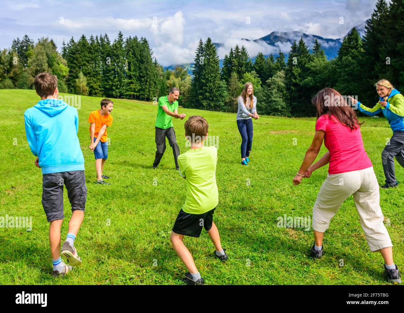 Funny afternoon in high ropes course Stock Photo - Alamy