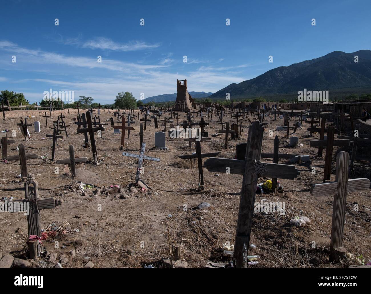 The historic Taos Pueblo cemetery in New Mexico, featuring weathered ...