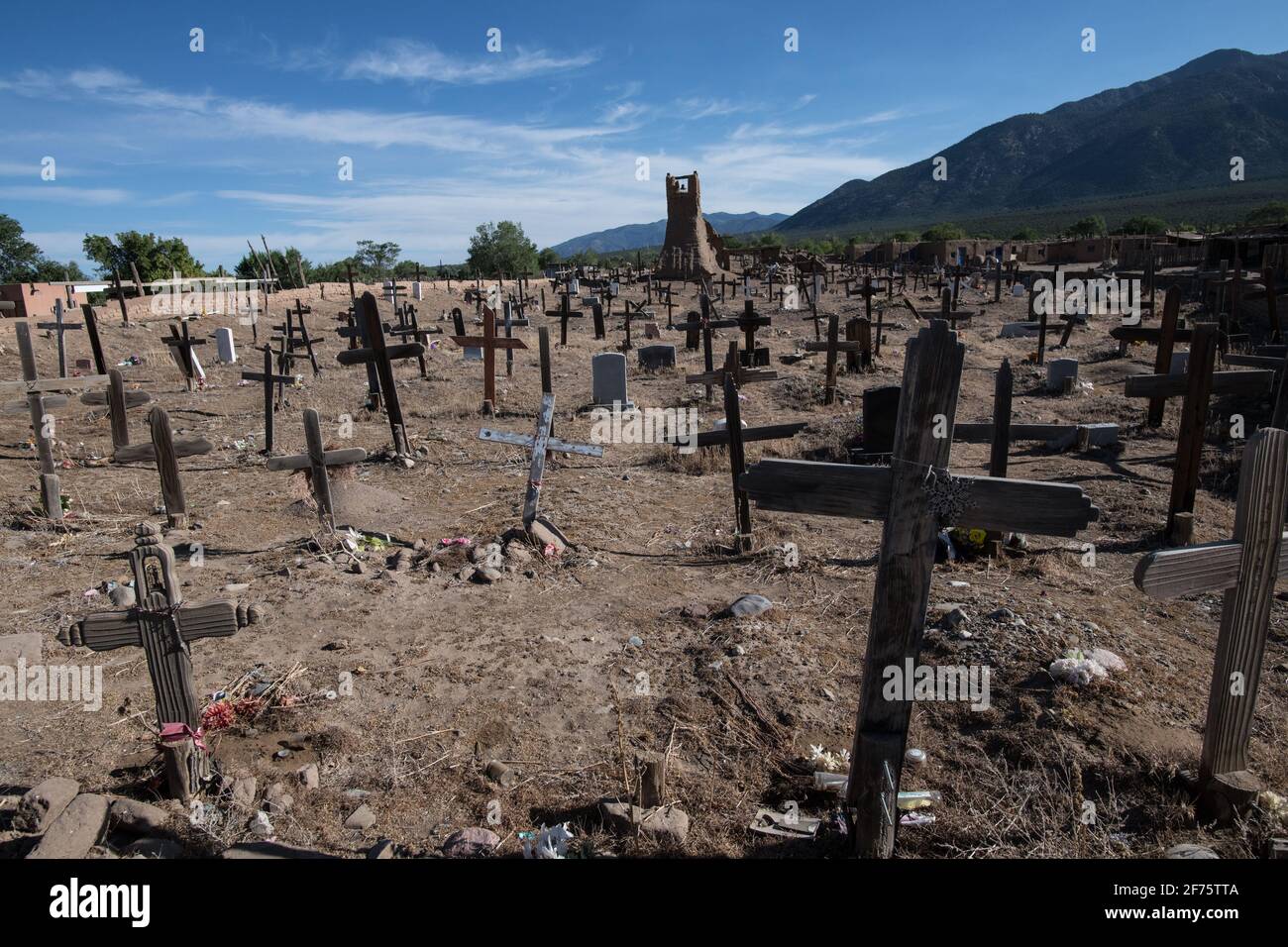 The historic Taos Pueblo cemetery in New Mexico, featuring weathered ...