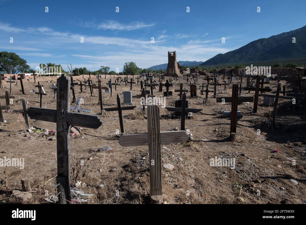 The historic Taos Pueblo cemetery in New Mexico, featuring weathered ...