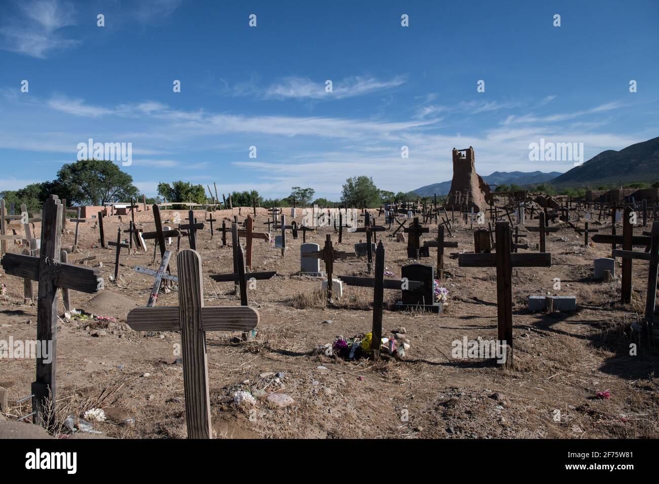 The historic Taos Pueblo cemetery in New Mexico, featuring weathered ...