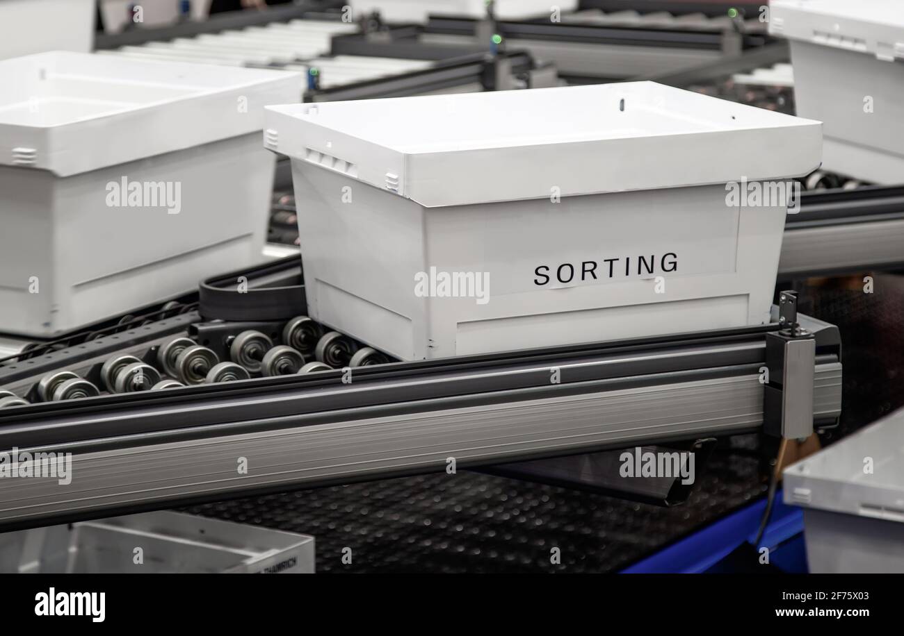 Automatic sorting system of plastic tray in production line Stock Photo ...