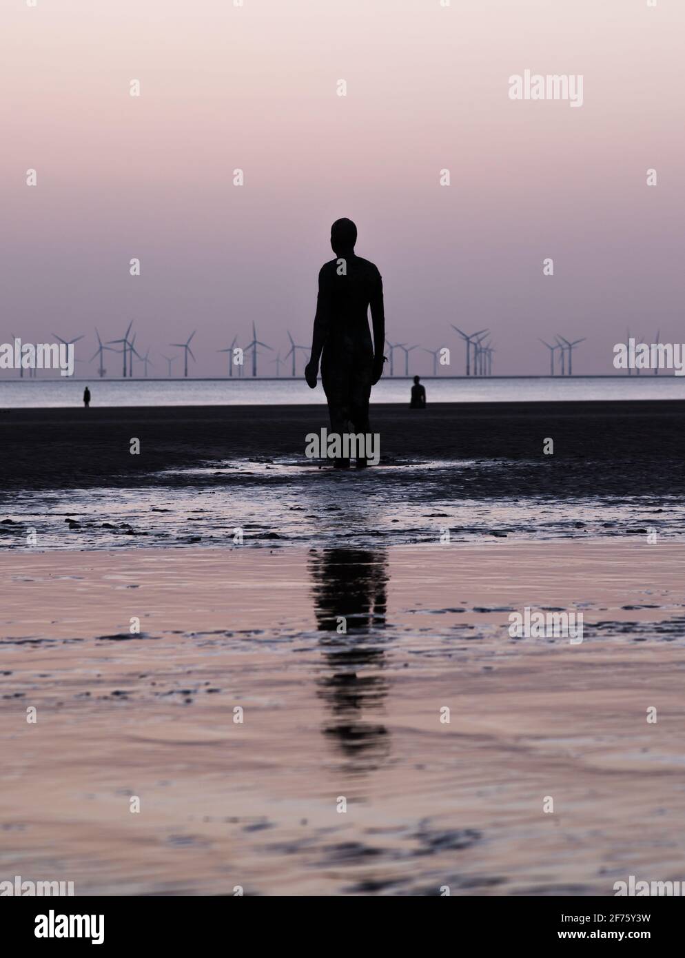 Antony gormley men at crosby beach hi-res stock photography and images ...