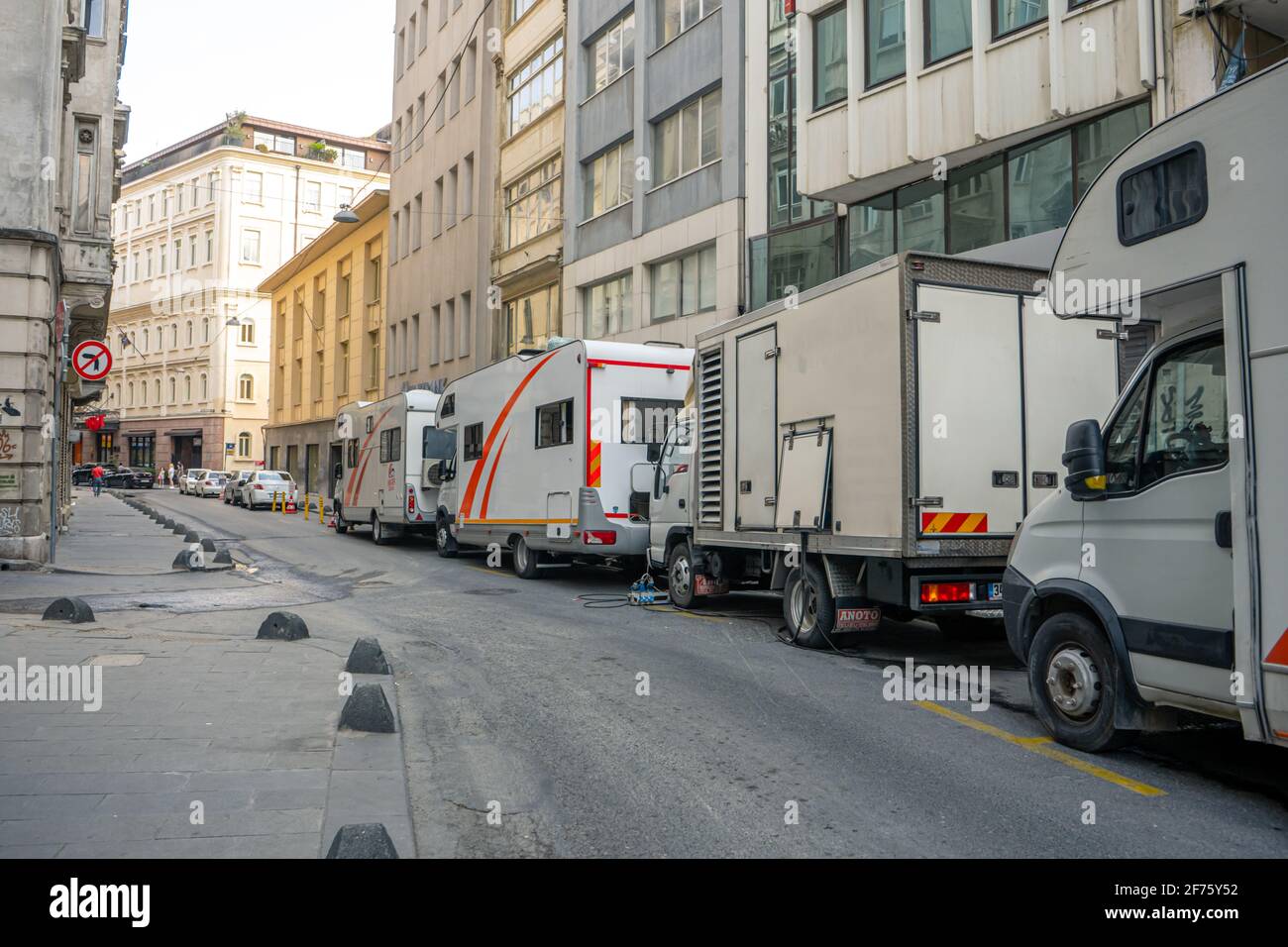 Crew cars with props for filming. Shooting a movie on the streets of ...