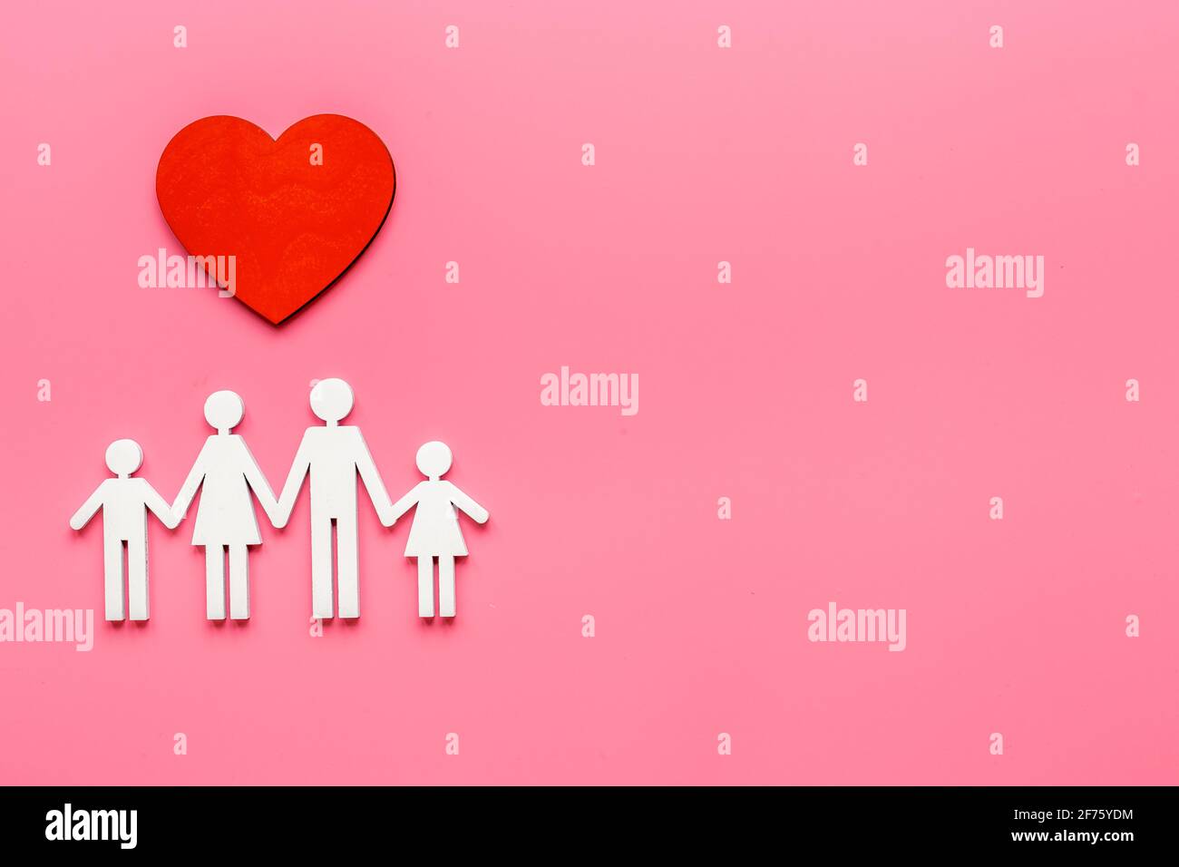 Health and medical care concept. Family figure with heart Stock Photo ...