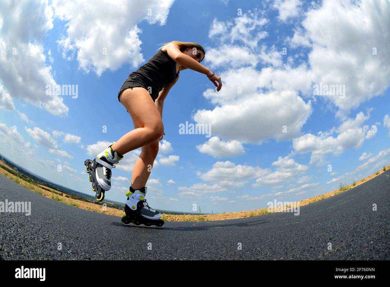 People inline skating hi-res stock photography and images - Alamy