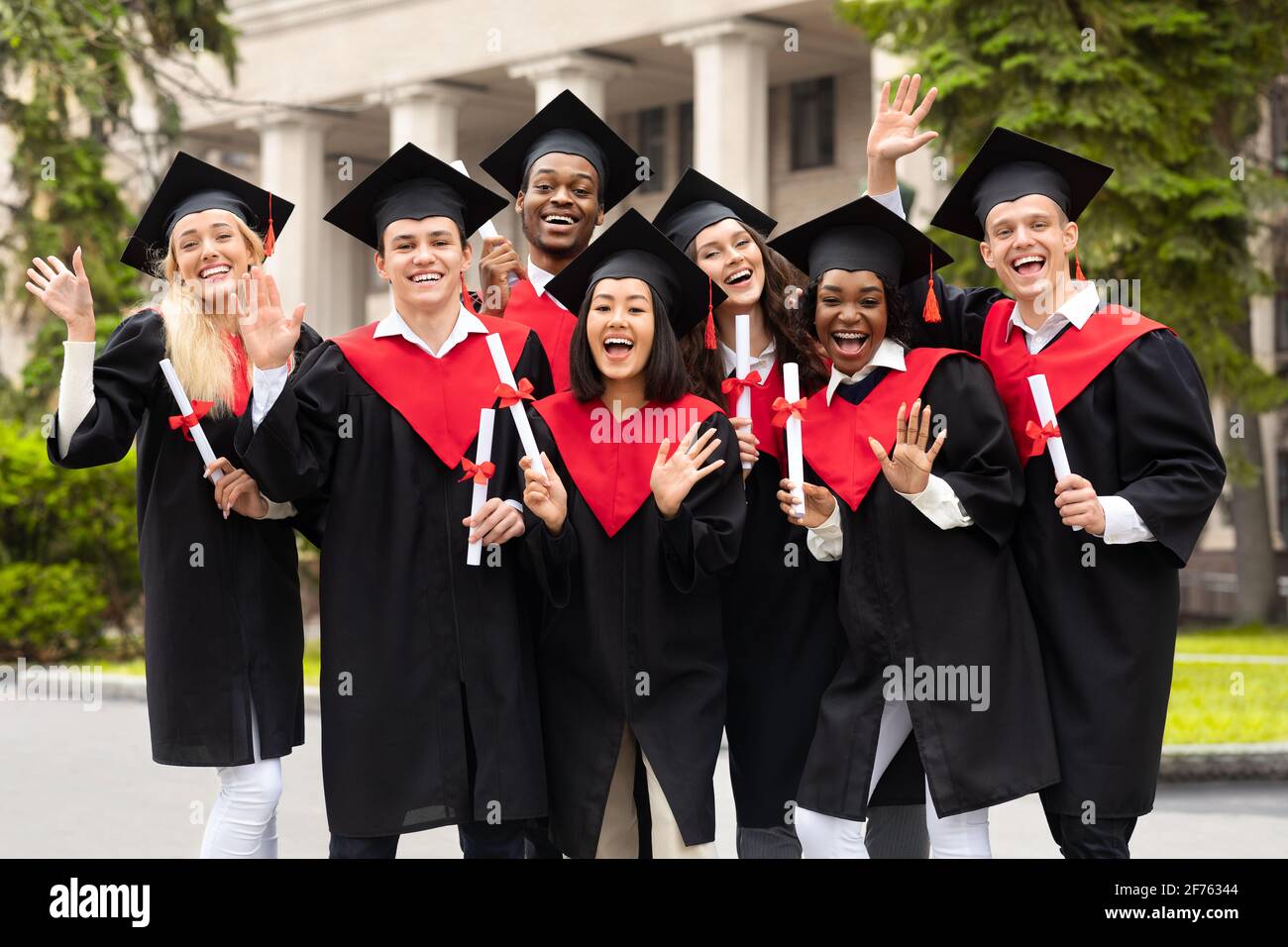 Diverse International Students With Diplomas Celebrating Graduation ...