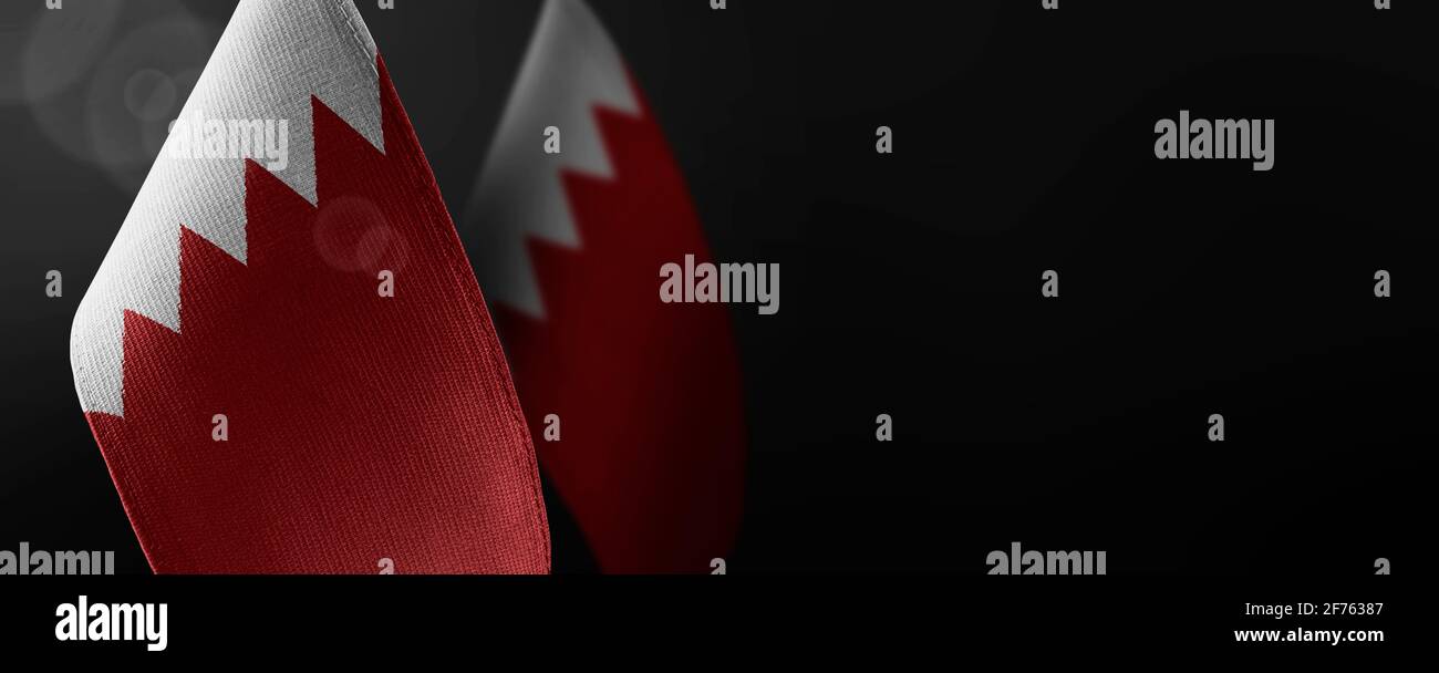 Small national flags of the Bahrain on a dark background Stock Photo ...
