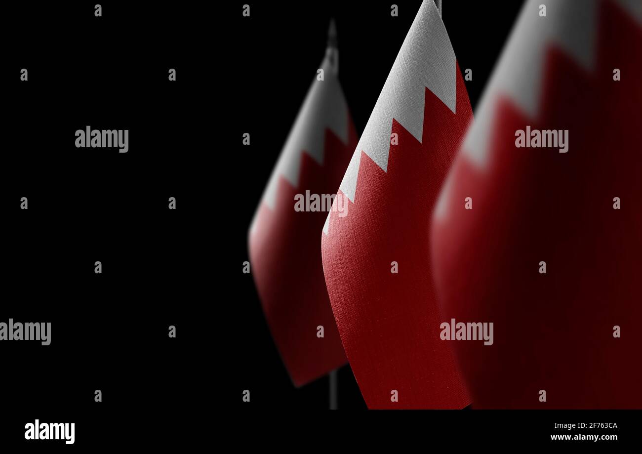 Small national flags of the Bahrain on a black background Stock Photo ...