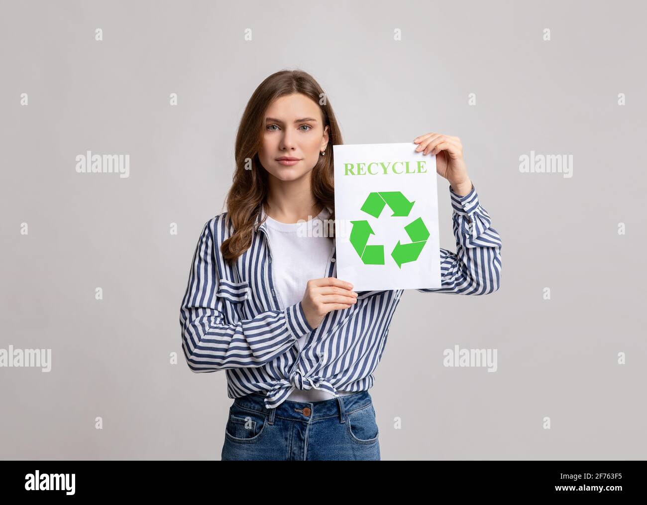 Young Environmental Activist Lady Holding Placard With Green Recycle ...