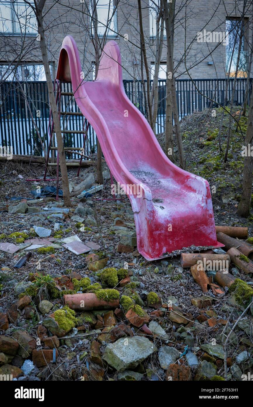 Freestanding abandoned old slide for children, left on the side Stock ...