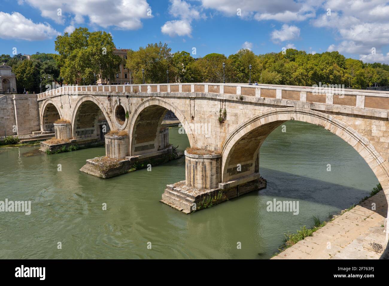 Ponte Sisto bridge over Tiber river in city of Rome, Italy, arch stone ...