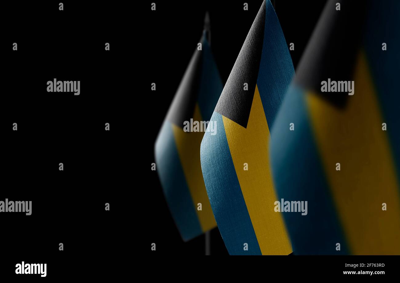Small national flags of the Bahamas on a black background Stock Photo ...