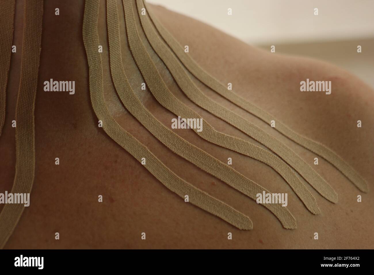 Woman taping neck hi-res stock photography and images - Alamy