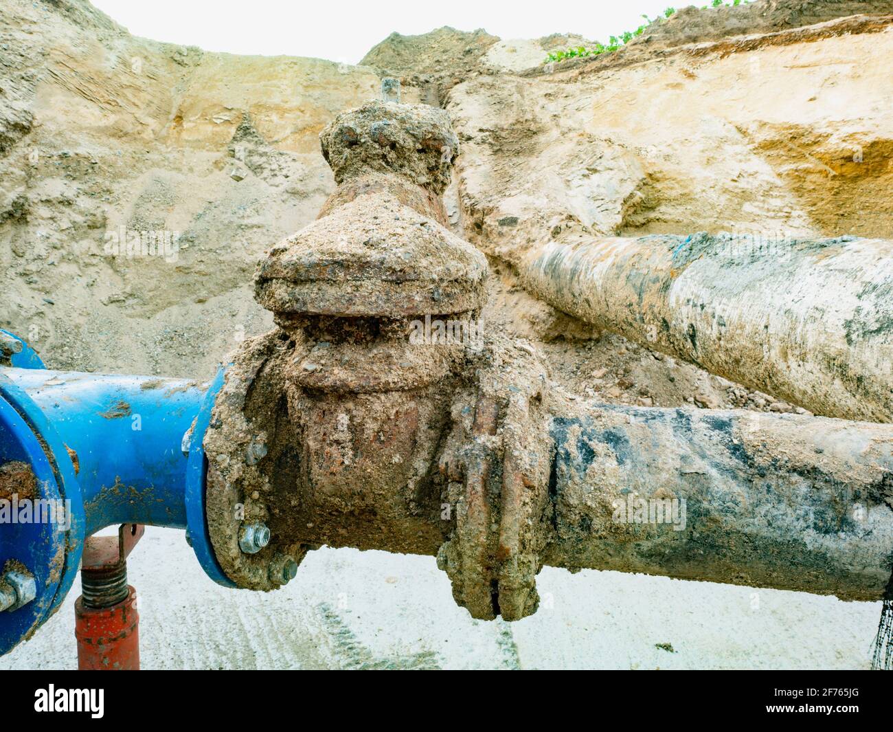 Pipes and a pipe for waterworks in digging in the road construct. Rewal ...