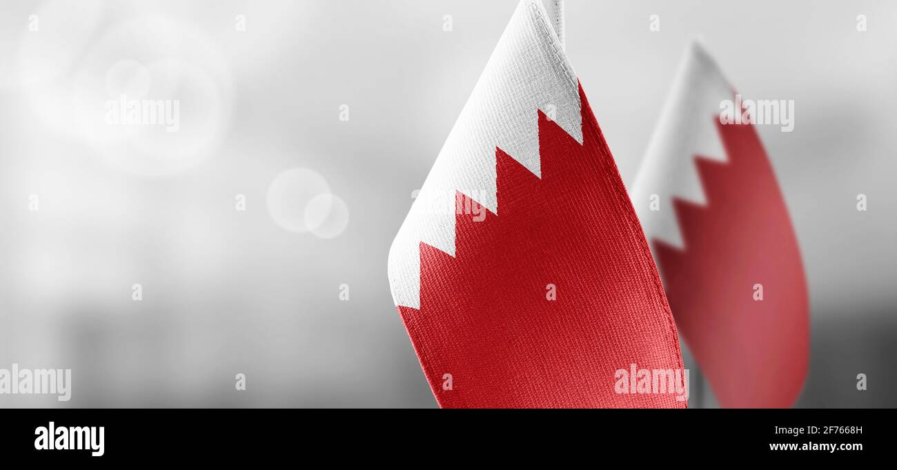 Small national flags of the Bahrain on a light blurry background Stock ...