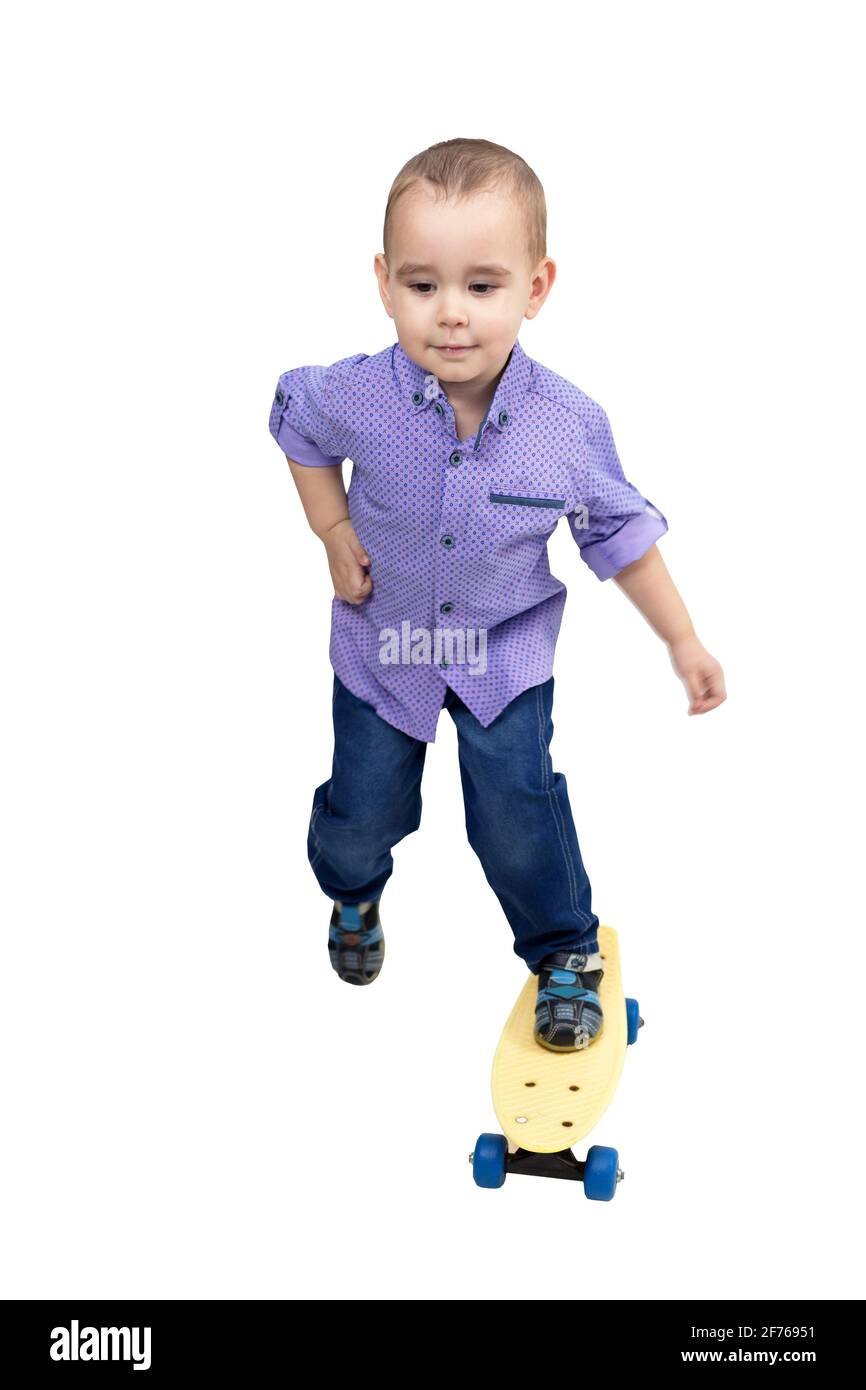 Little boy riding a skateboard isolated, White background Stock Photo ...