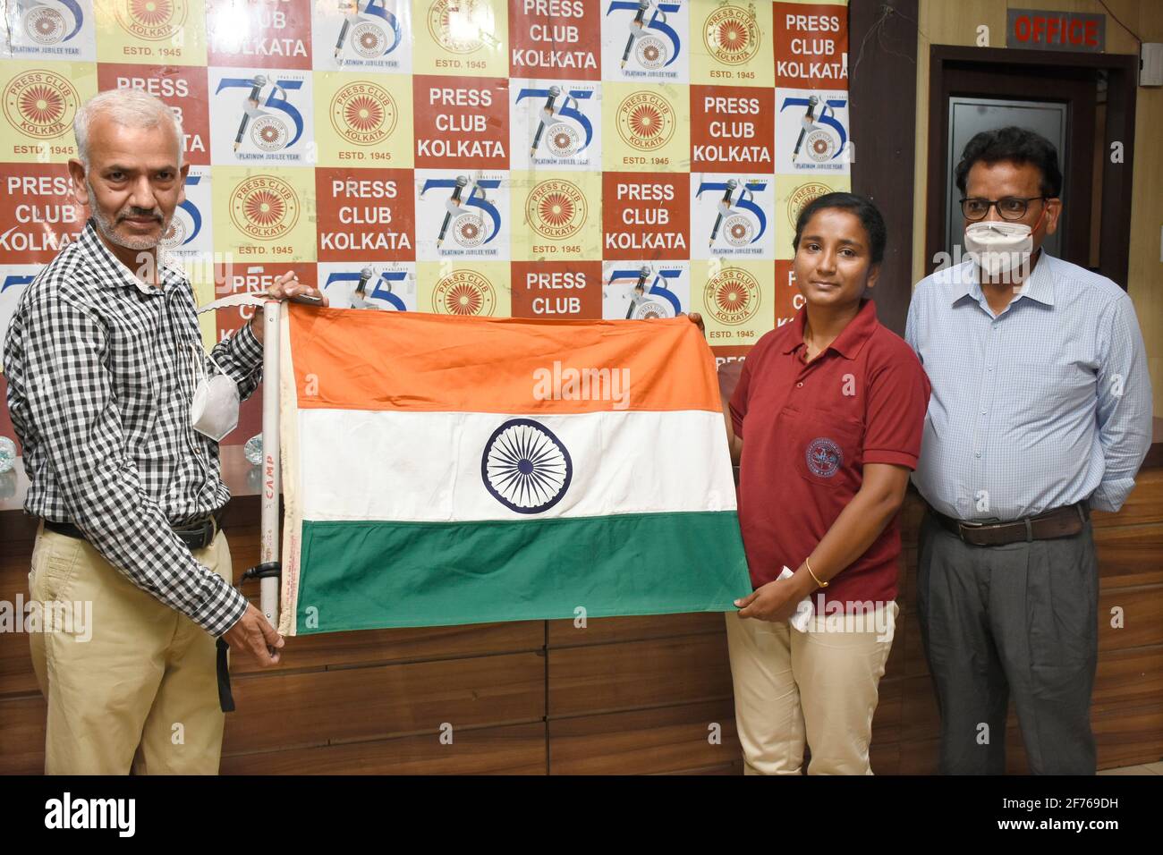 Everester Basanta Singha Roy handed over the Indian Flag to Rumpa Das in flag off ceremony who ...