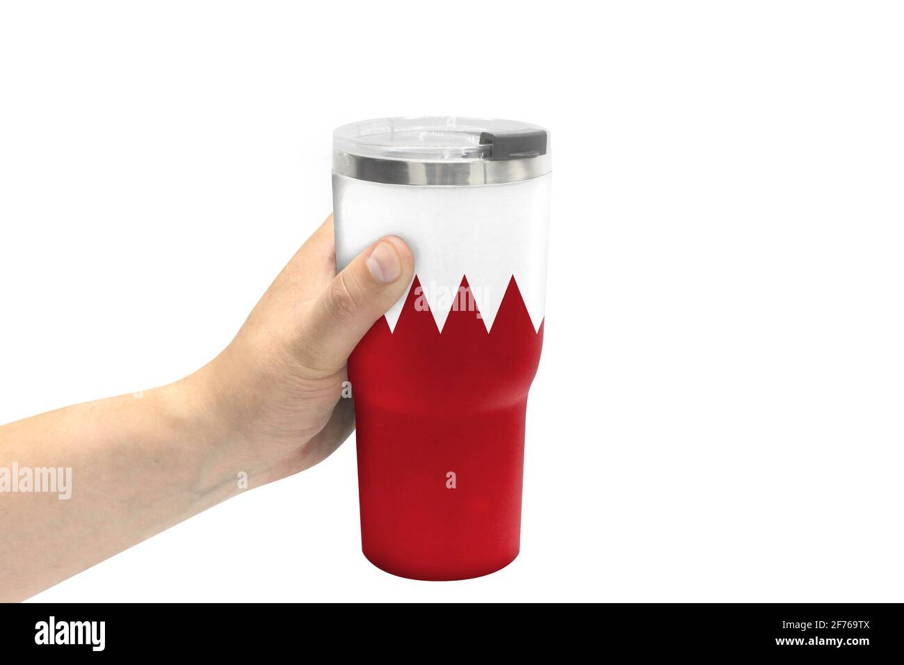 A hand holds a sports water bottle with the flag of Bahrain on the ...