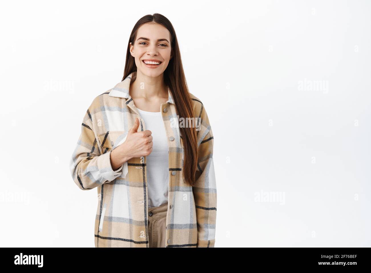 Well done, I like it. Smiling satisfied woman shows thumbs up in ...