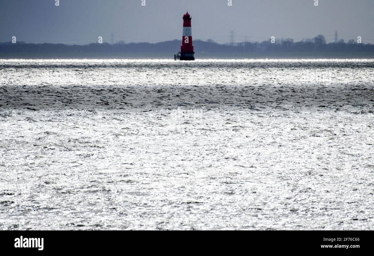 Butjadingen, Germany. 05th Apr, 2021. The historical lighthouse Arngast ...