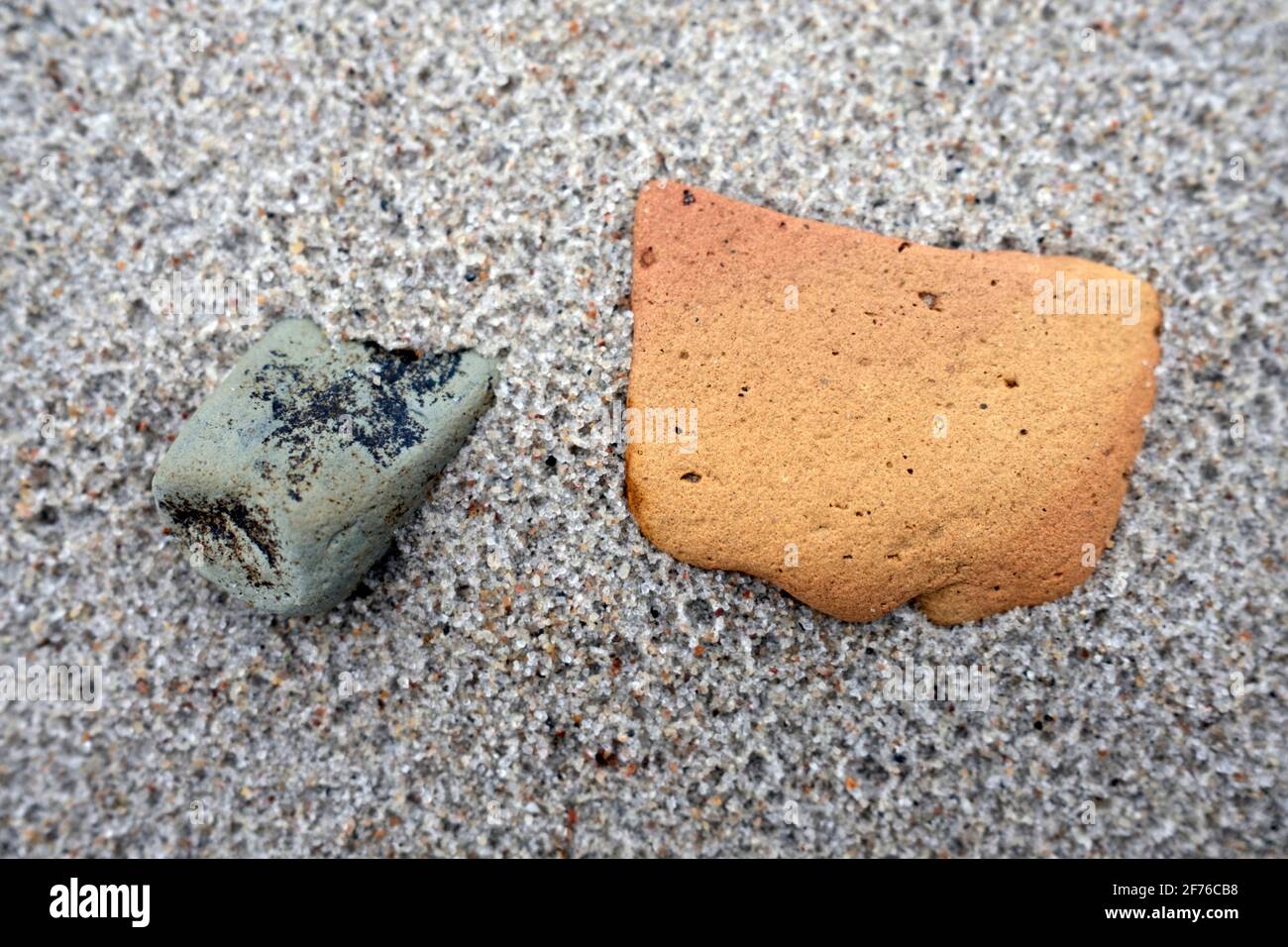 Pebbles in sand hi-res stock photography and images - Alamy