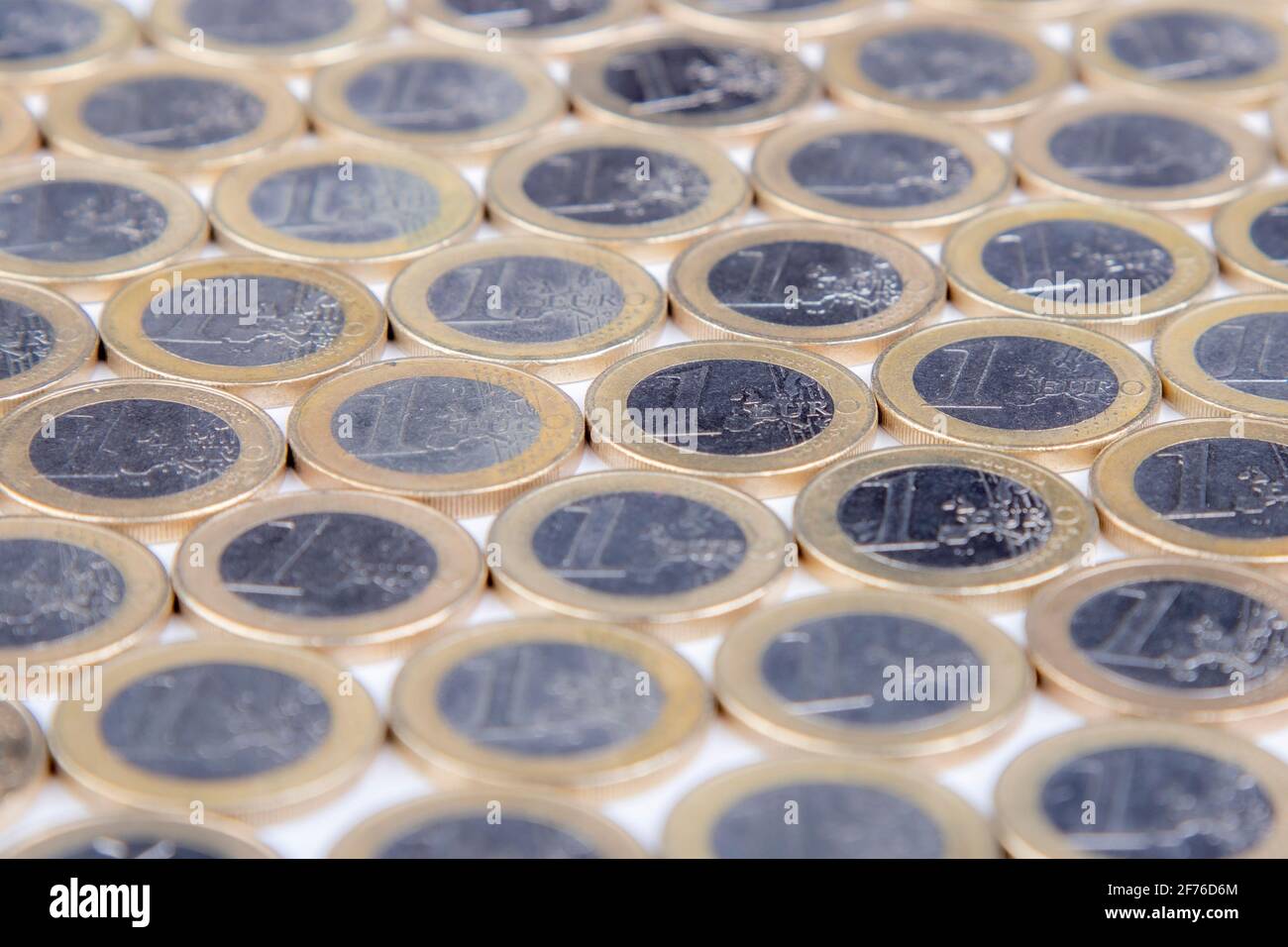 one euro coins in a row as background Stock Photo - Alamy