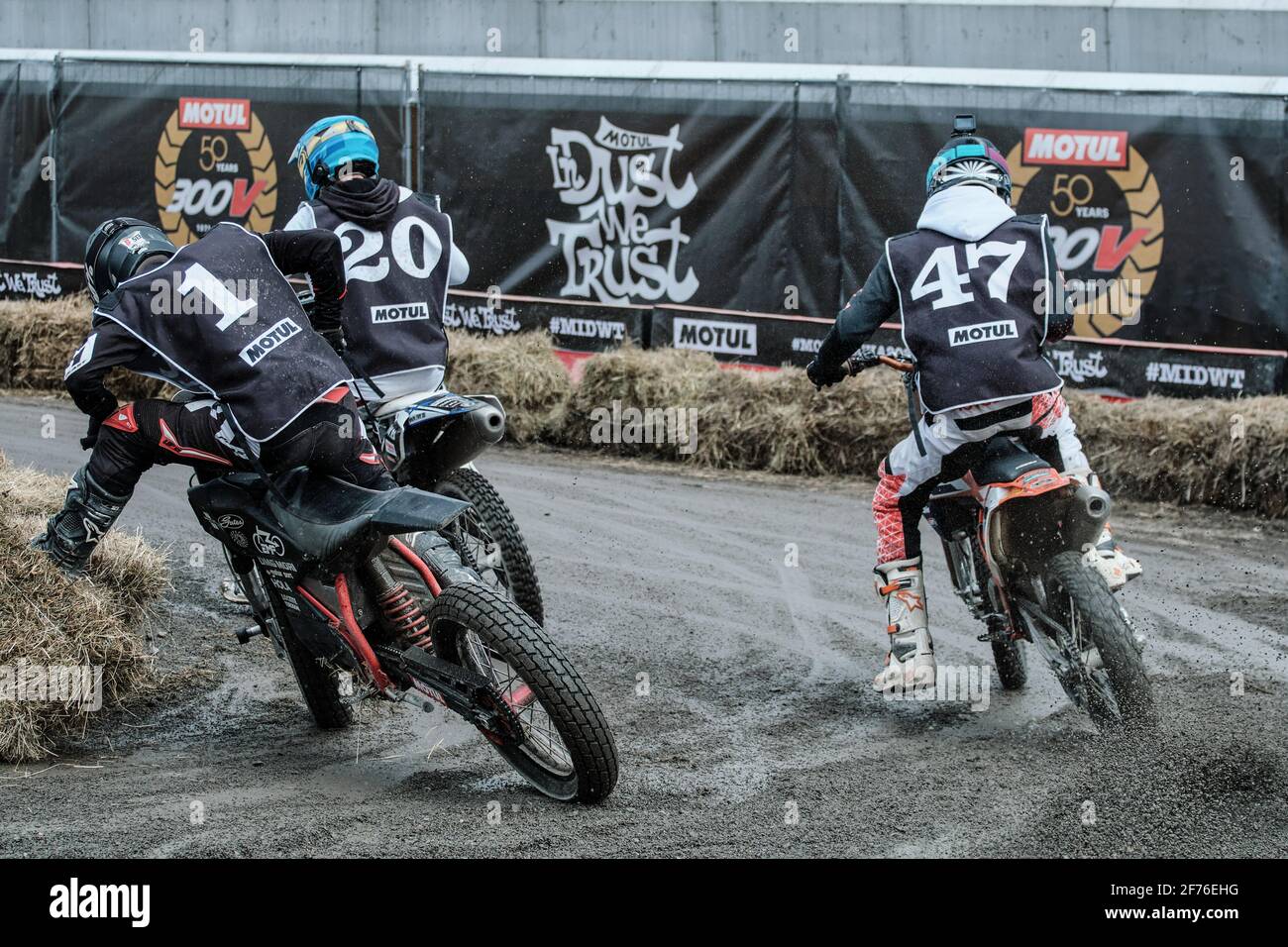 Motorcycle race competitors taking a corner during the exhibition. The ...