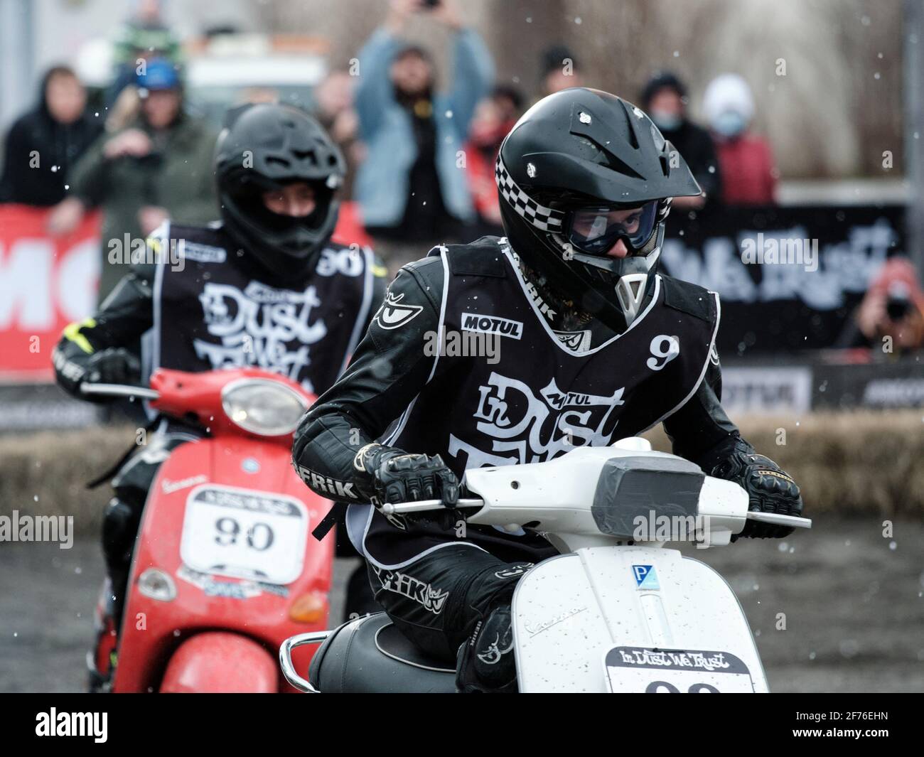 Scooter race participants competing during the exhibition. The annual ...