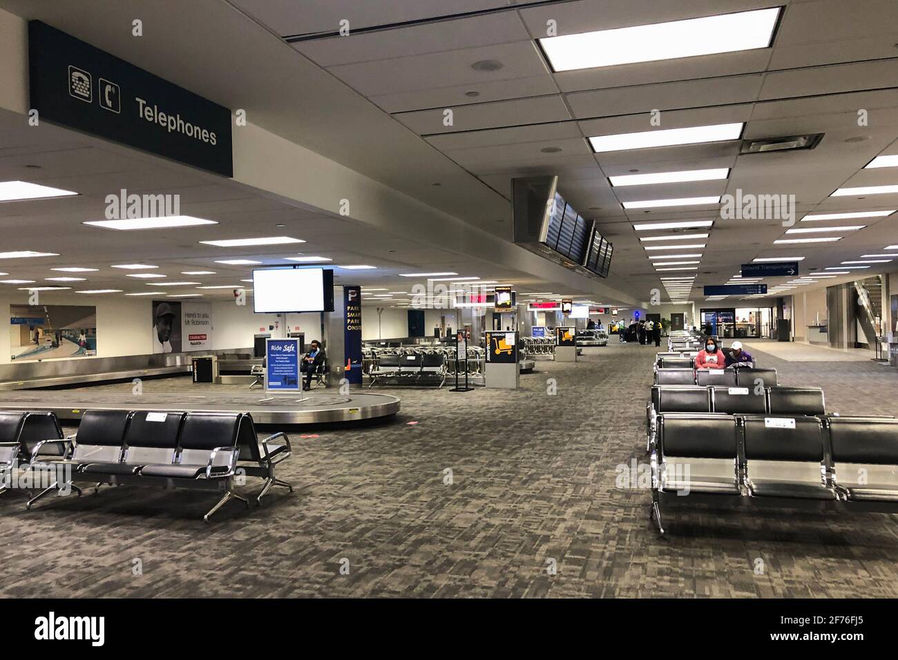 Passengers wait in Terminal 2 at Fort Lauderdale-Hollywood ...