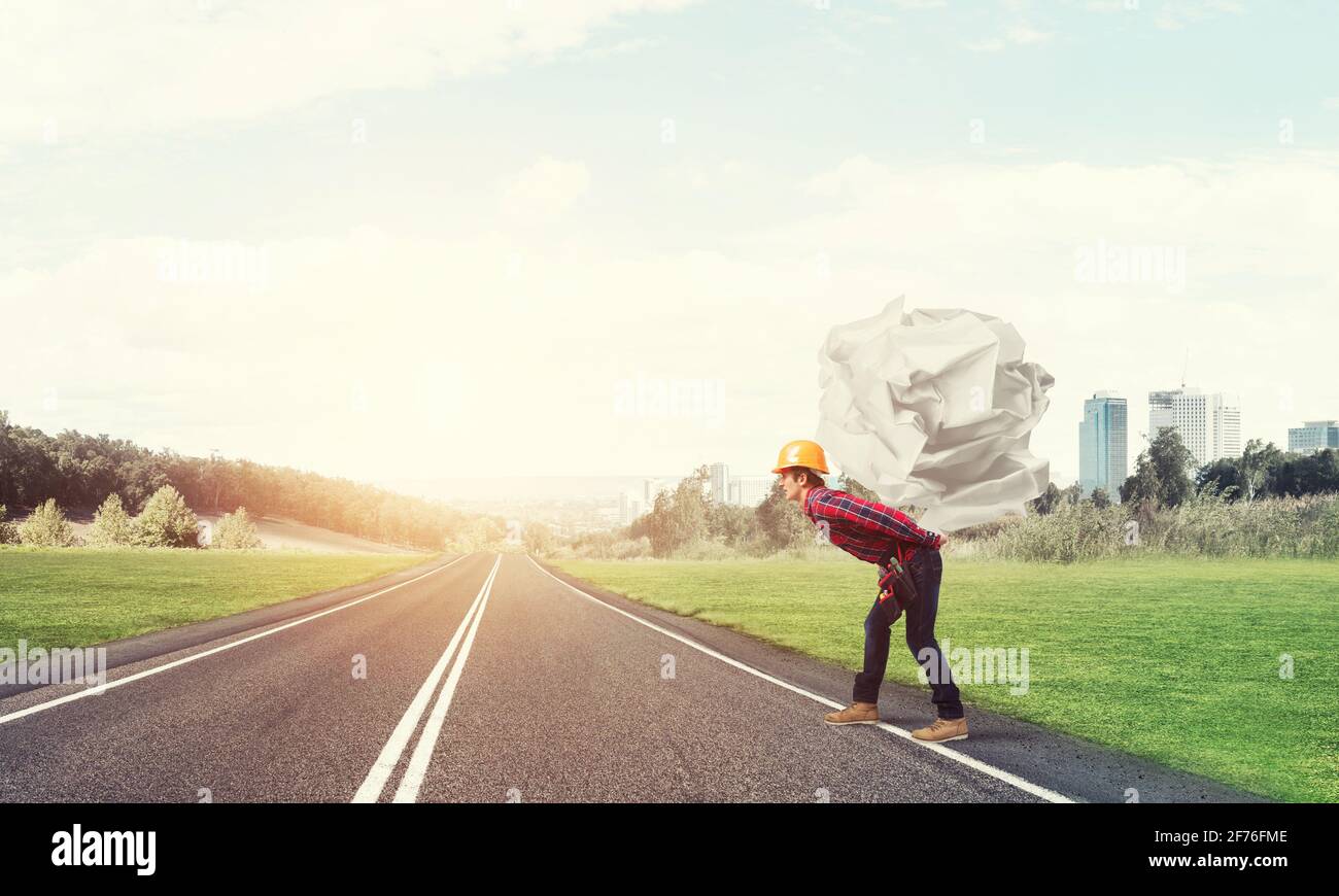 Engineer man carry load Stock Photo - Alamy