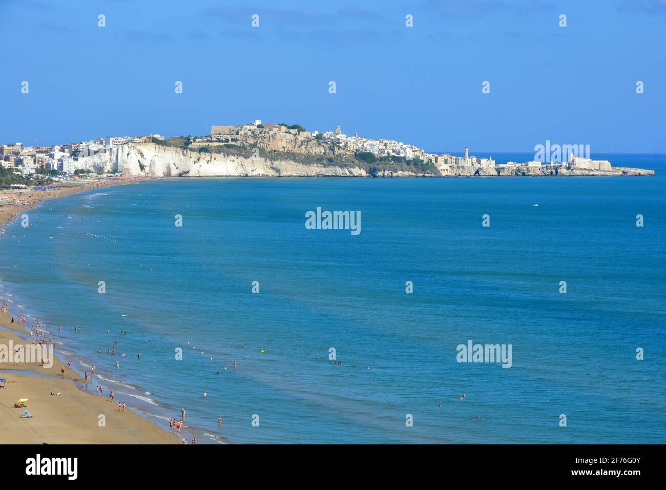 The beautiful old town of Vieste with its blue waters and beaches on ...