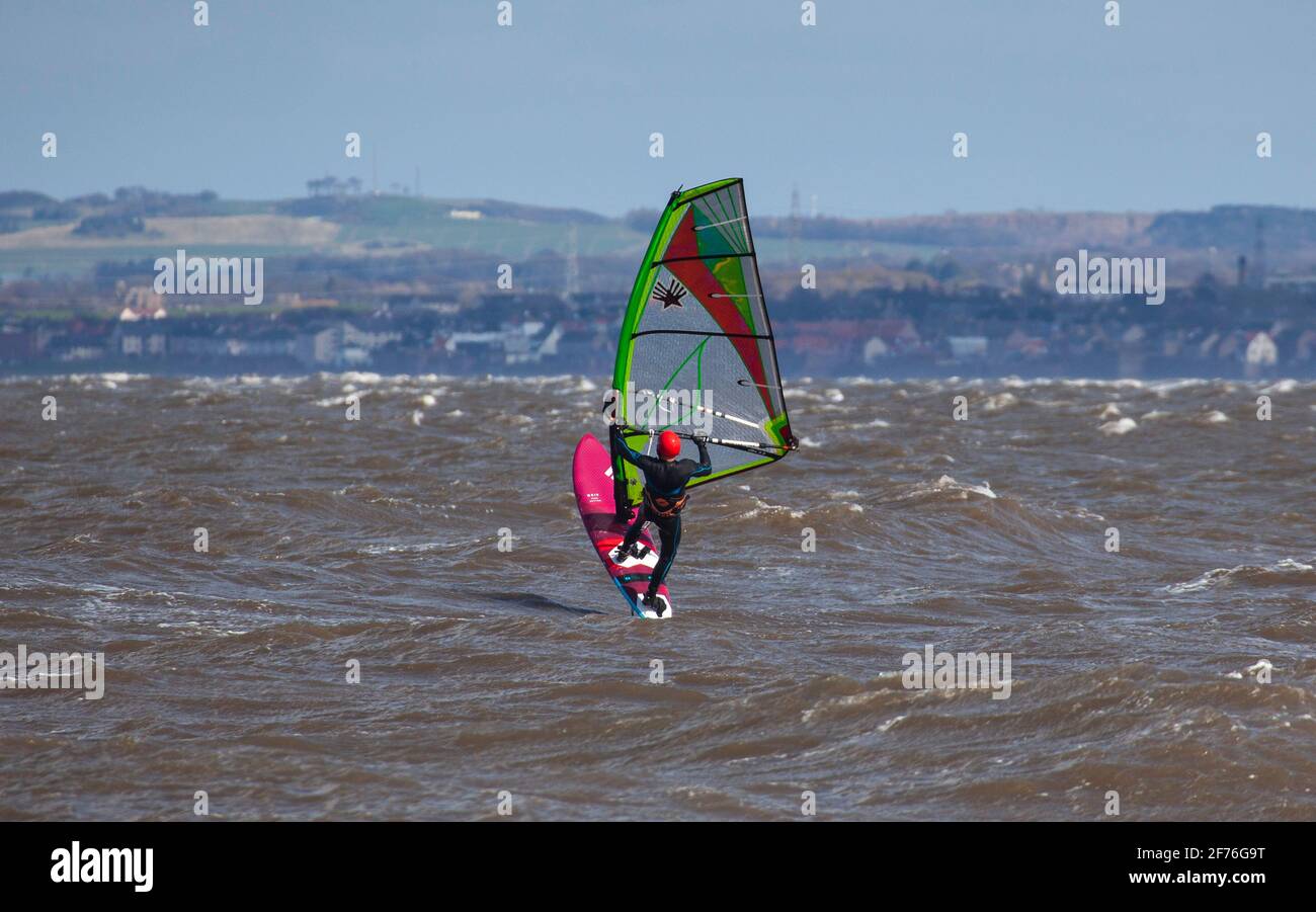 Portobello, Edinburgh, Scotland, UK weather. 5th April 2021. Windsurfer ...