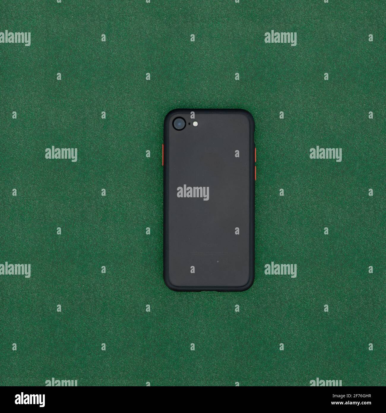 Back of a smart-phone on top of a plain background Stock Photo - Alamy